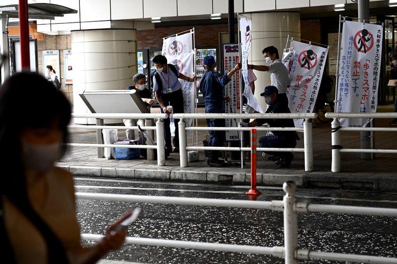 Walkie, no talkie: Japan city launches pedestrian smartphone ban