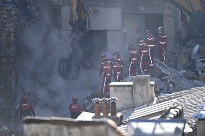 Two bodies found in French building collapse as rescue efforts continue