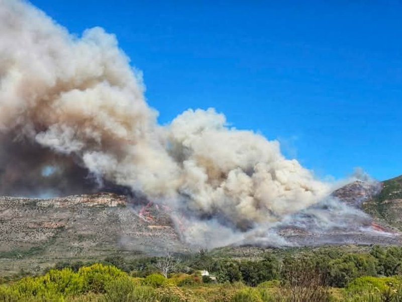 Nearly 200 households evacuated amid Table Mountain fire