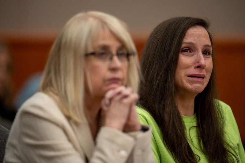 US children's book author sentenced to life after poisoning husband