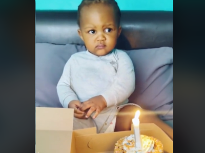 Baby learns the hard way not to touch fire