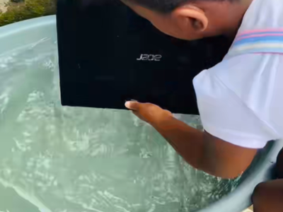 Mom finds her daughter cleaning her laptop with water