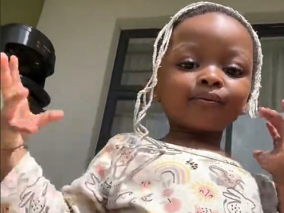 Mop strands transformed into pure beauty by little girl