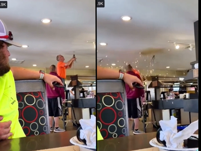 WATCH: Surely 'how to handle a live wire' was covered in electrical 101?