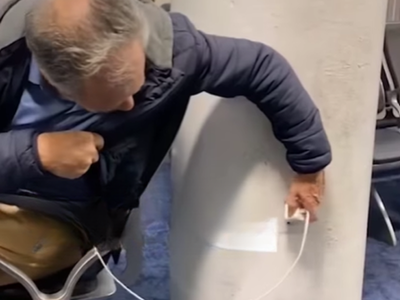 Airport passengers pranked with fake plug point stickers