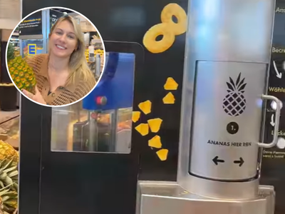 This grocery store has a special pineapple cutting machine