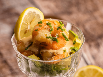 'Boujee' Avocado Ritz in a coupe glass recipe