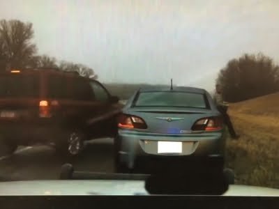 Cop dodges car sliding on ice by the skin of his teeth!