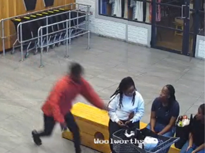 Man grabs woman's phone out of her hands at shopping mall
