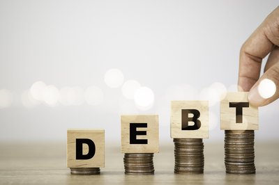 Five signs that you over-indebted and how to get help