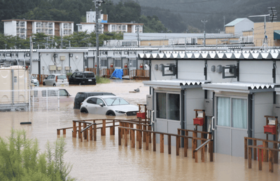 Floods, landslides hit central Japan months after major quake