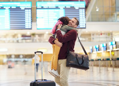 New Zealand airport sets three-minute limit on hugs