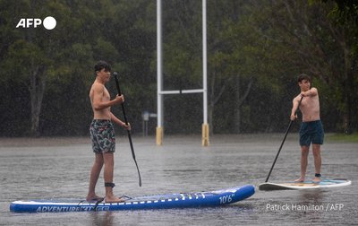 Rooftop rescues in Australia as tens of thousands evacuated from floods