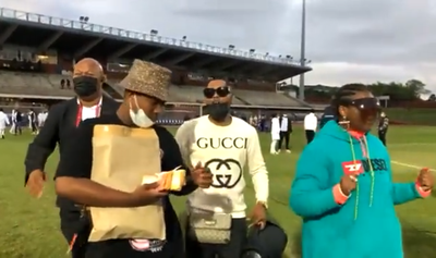 WATCH: Royal AM owners dole out cash to players on the pitch