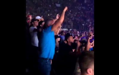 Guy dances like crazy at Drake concert