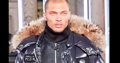 Former convict and ‘hot mugshot guy’ makes runway debut