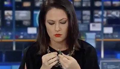 Newsreader reacts hilariously to being caught daydreaming