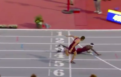 Athlete dives towards finish line for gold medal