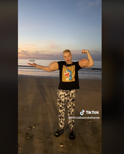 Man shows off strange arm muscle modification