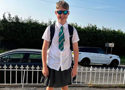 Boys protest school uniform policy by wearing skirts