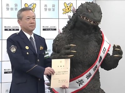 World’s coolest police chief? Godzilla takes the reins for a day