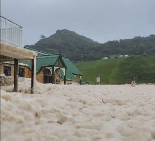 WATCH: Victoria Bay battered by raging seas as waves flood beachfront homes