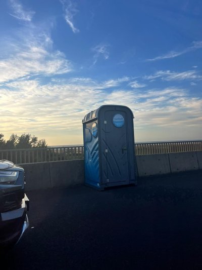 Loo-light gang: Porta loo stuck on M4
