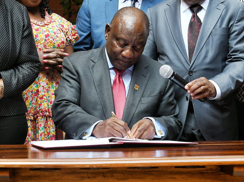 Ramaphosa signs contested bill in test for unity govt