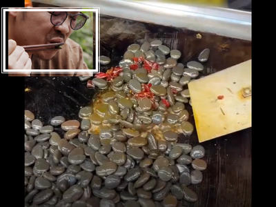 Chinese street food that contains stir-fried river rocks