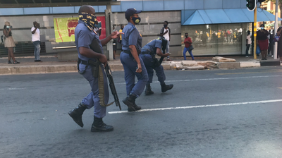 Police fire rubber bullets at anti-migrant protesters in Johannesburg