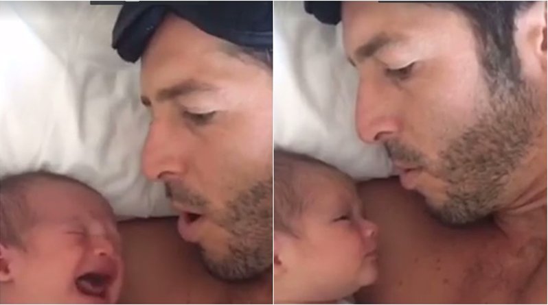 Watch dad put his baby to sleep with this simple chant