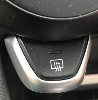 KZN hilariously tries to figure out this button in a car