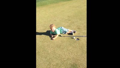 Toddler throws adorable tantrum after realising golf is too difficult