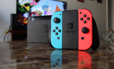 Nintendo logs nine-month profit leap, upgrades annual forecast