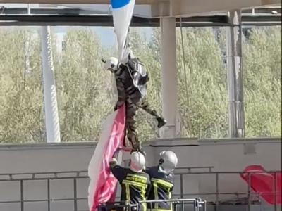 WATCH: Rugby game postponed after man gets stuck on roof