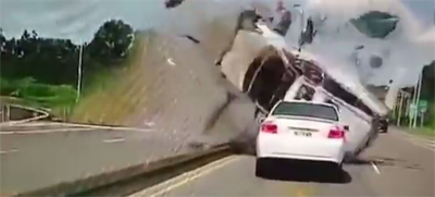 Driver hurtled through car window but survives