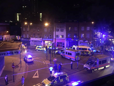 One killed after van crashes into pedestrians in London