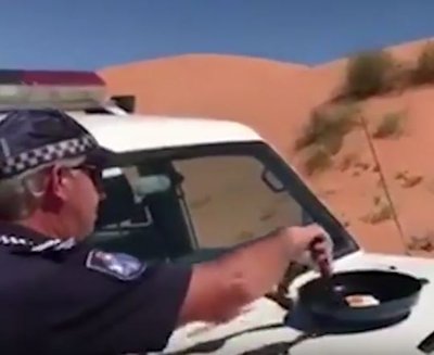 Video of policeman frying an egg on car's bonnet goes viral