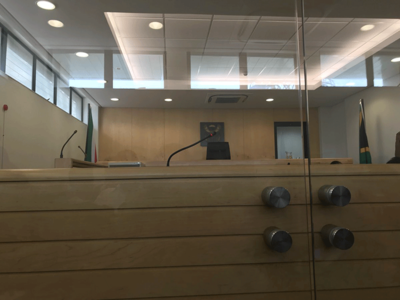 Suspect in Phoenix triple murder collapses in court