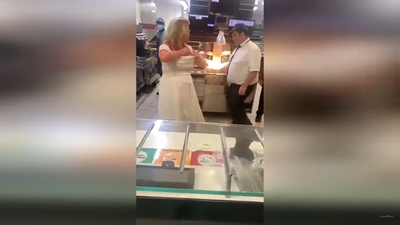 WATCH: Woman stuffs burgers in her bra at popular restaurant